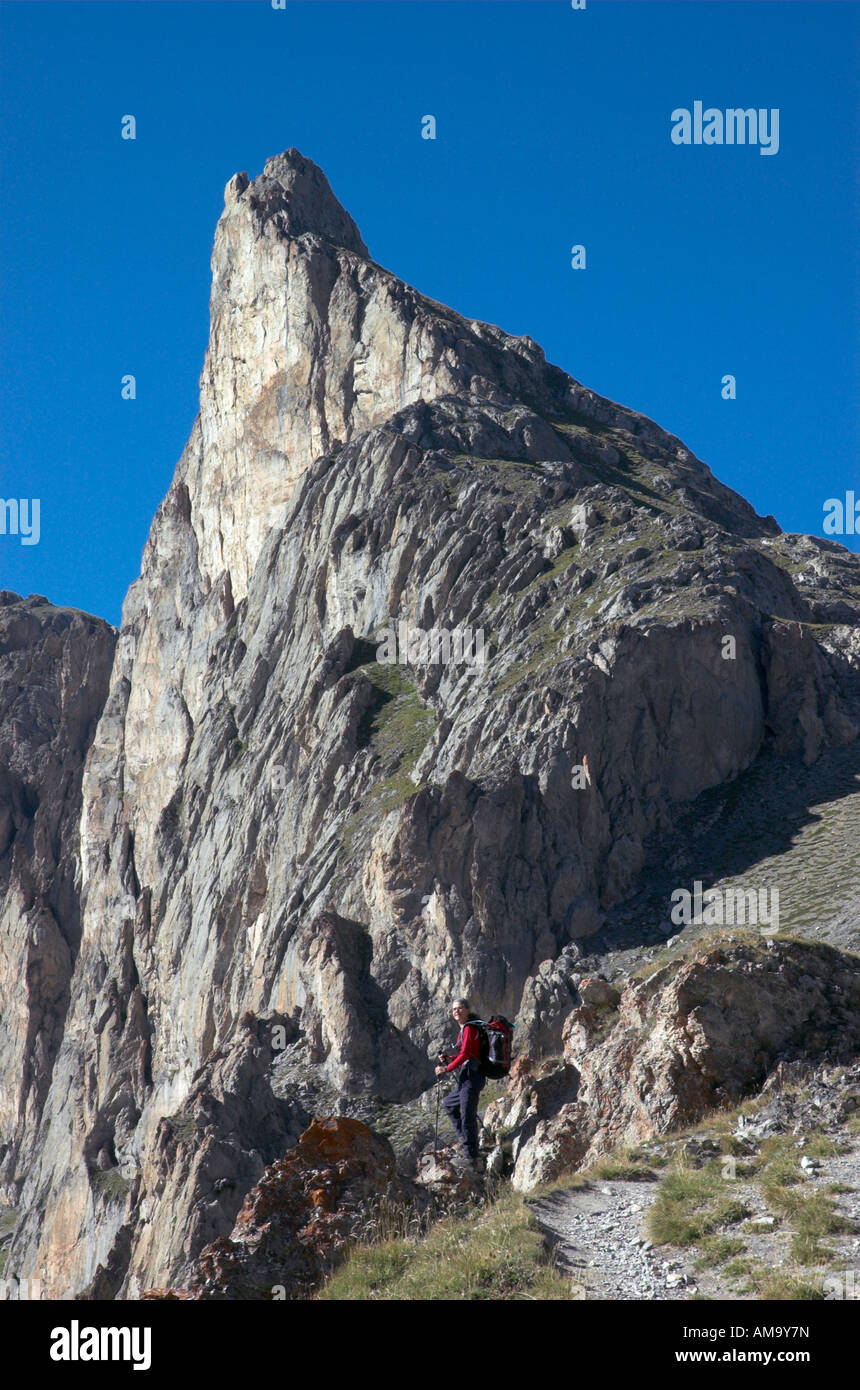 A mountain walker on a footpath in the French Alps Stock Photo - Alamy
