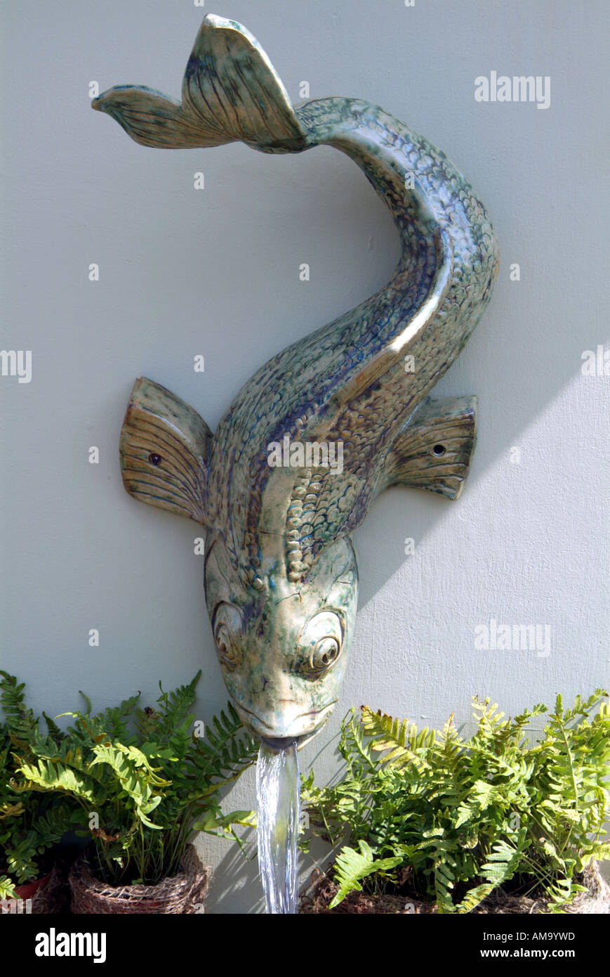 Ceramic hand made studio water fountain wall mounted carp fish Stock ...
