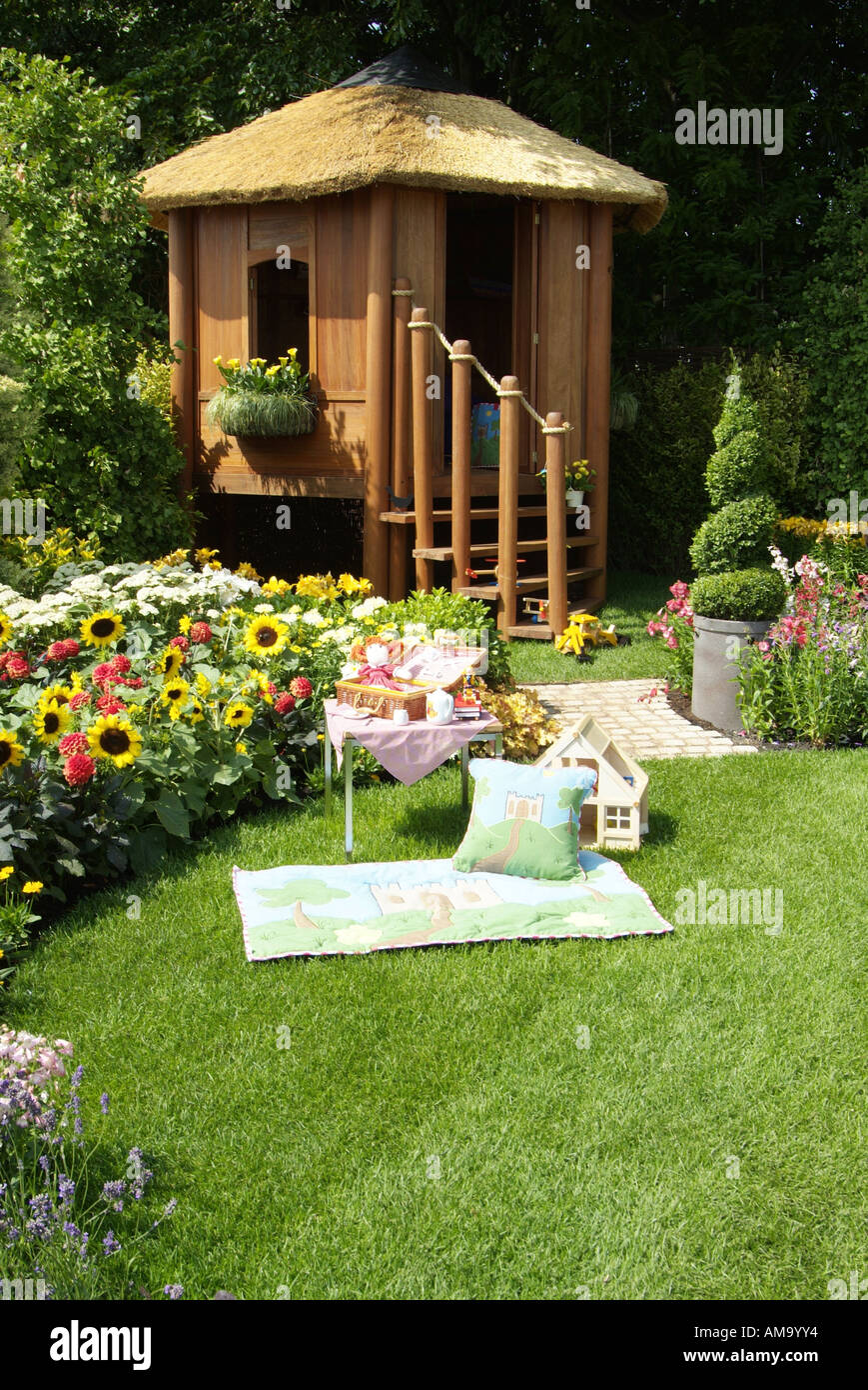 Summer house thatch rural garden Tatton stilt elevated cultivated grow ...