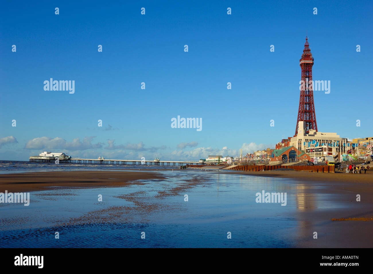 blackpool tower north pier beach and promenade shot from central pier ...