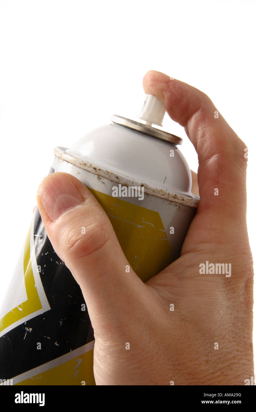 Hand holding a spray can Stock Photo - Alamy