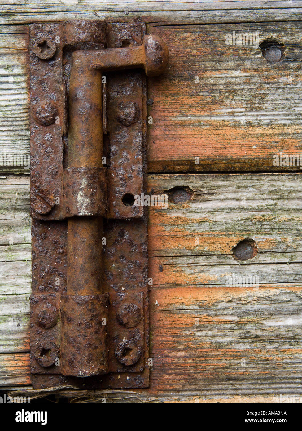Old wooden door with rusty bolt Stock Photo - Alamy