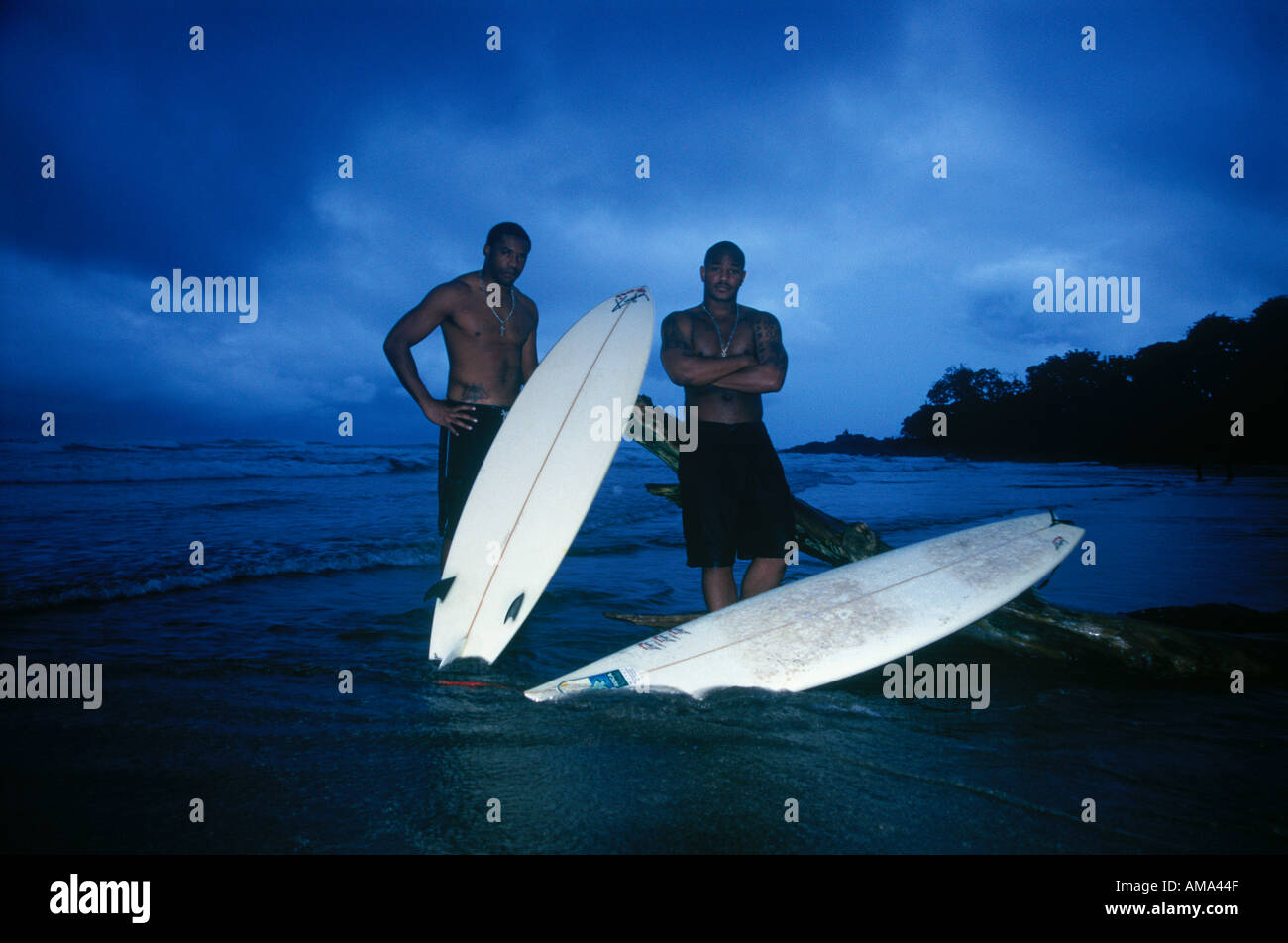 Derrick Mayes Football Player with his surfboard Stock Photo - Alamy