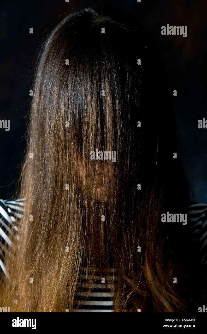 woman with hair covering face Stock Photo - Alamy