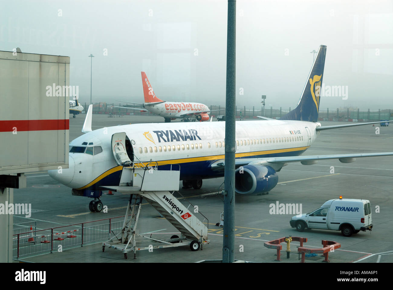 UK RYANAIR AND EASYJET PLANES READY TO TAKE OFF AT STANSTED AIRPORT ...
