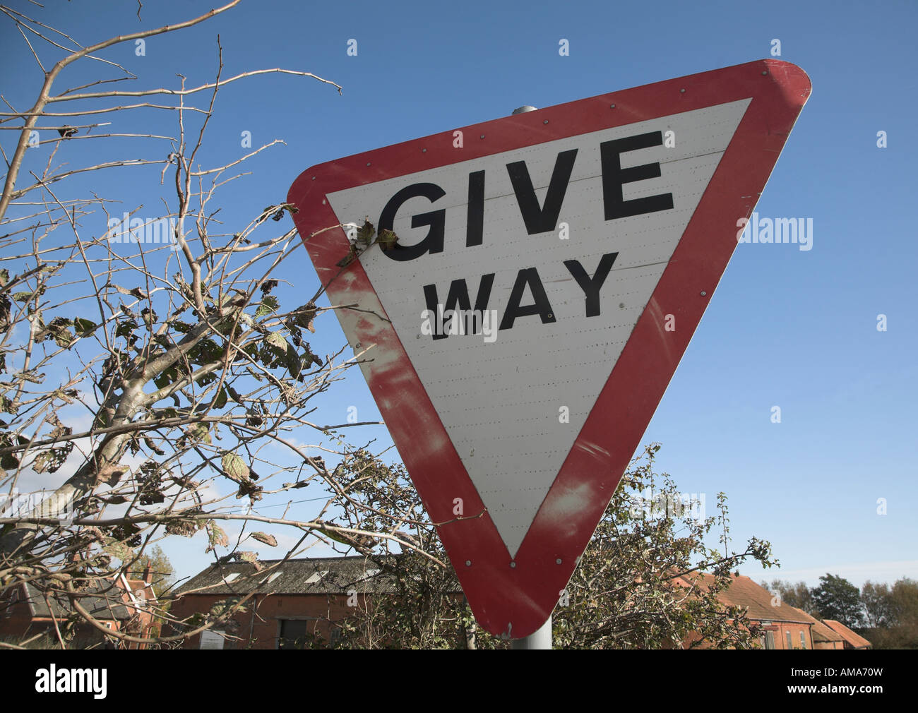 Triangular Give Way road sign Stock Photo - Alamy Triangular Give Way road sign Stock Photo - Alamy