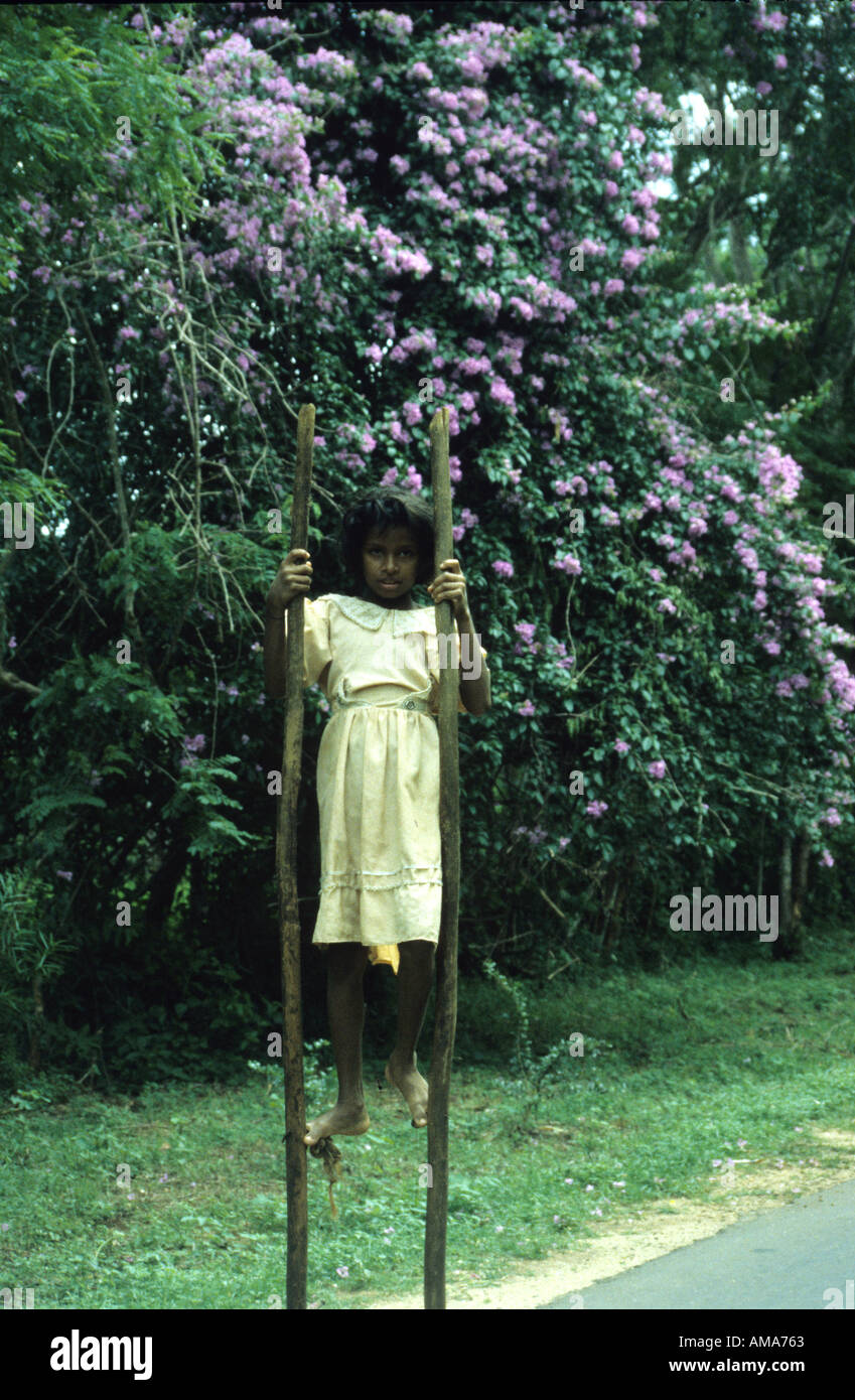 girl of stilts Stock Photo - Alamy