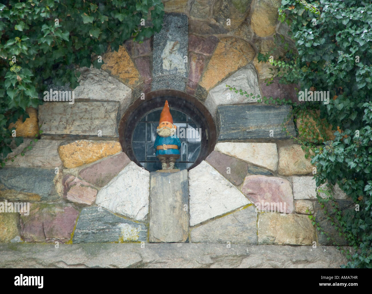 Hand carved statue of an elf Stock Photo - Alamy