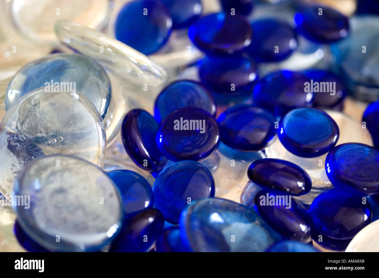 Glass discs in shades of blue and clear (2 Stock Photo - Alamy