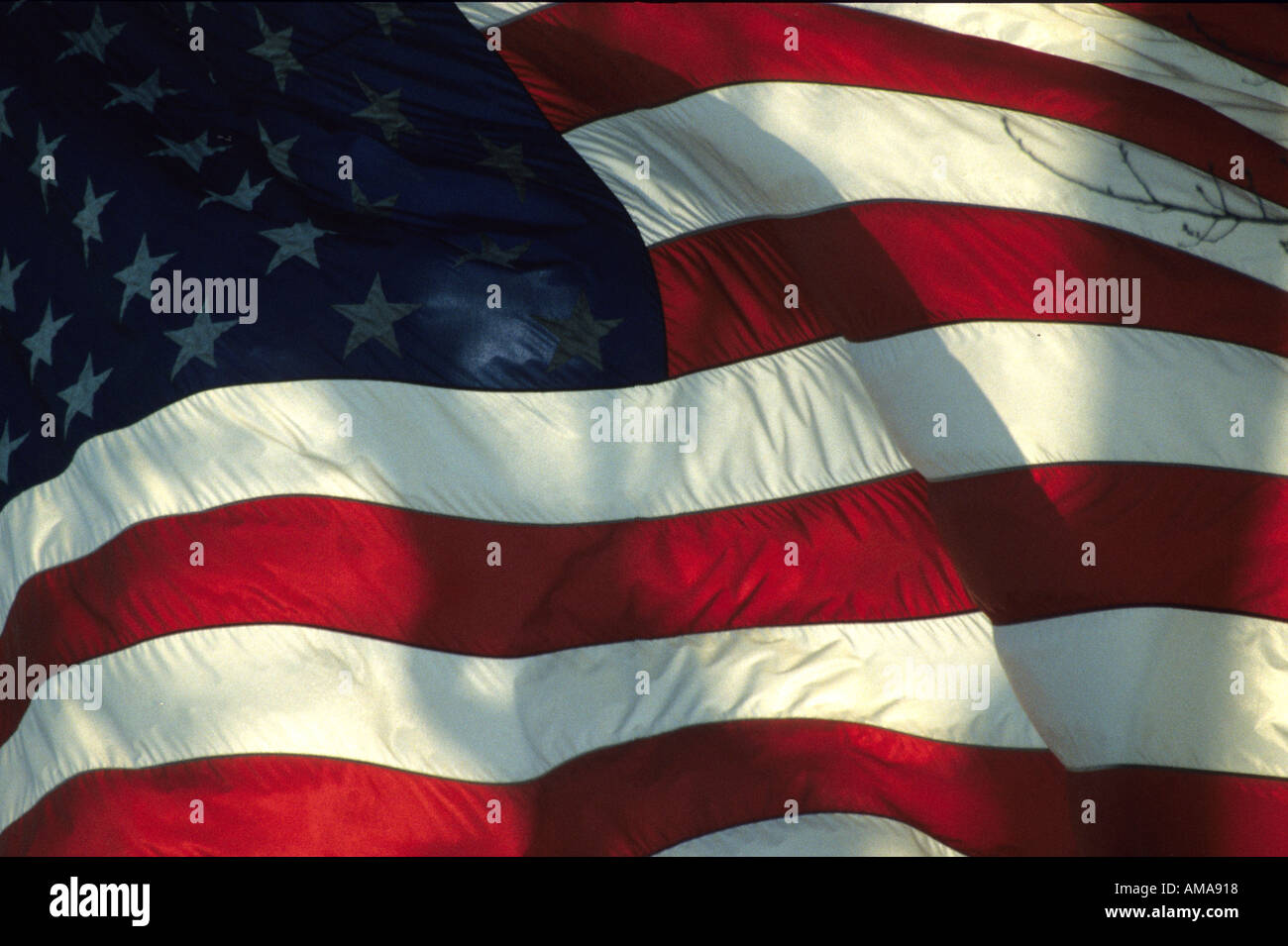 American flag flying in breeze Stock Photo - Alamy