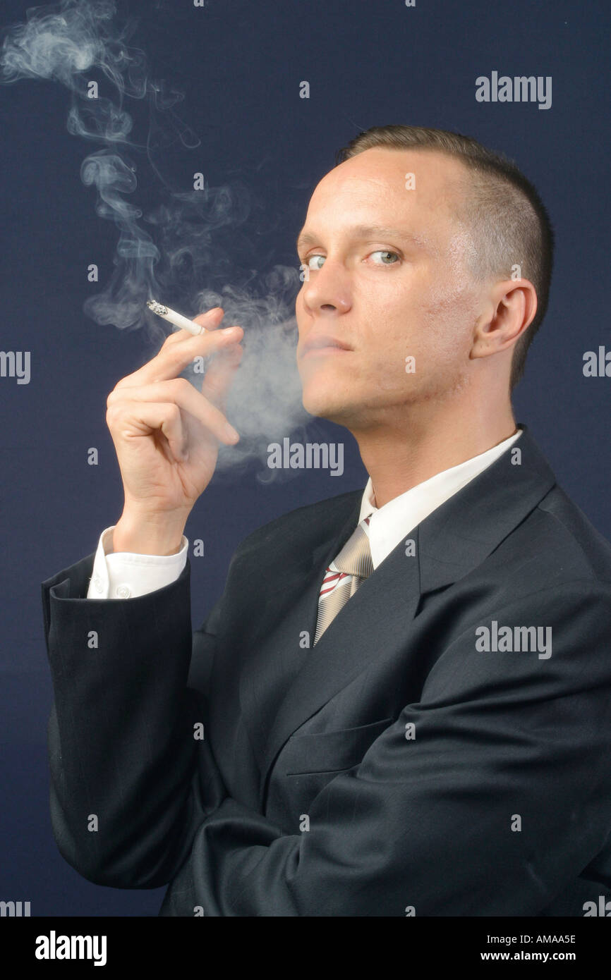 Smocking men hi-res stock photography and images - Alamy