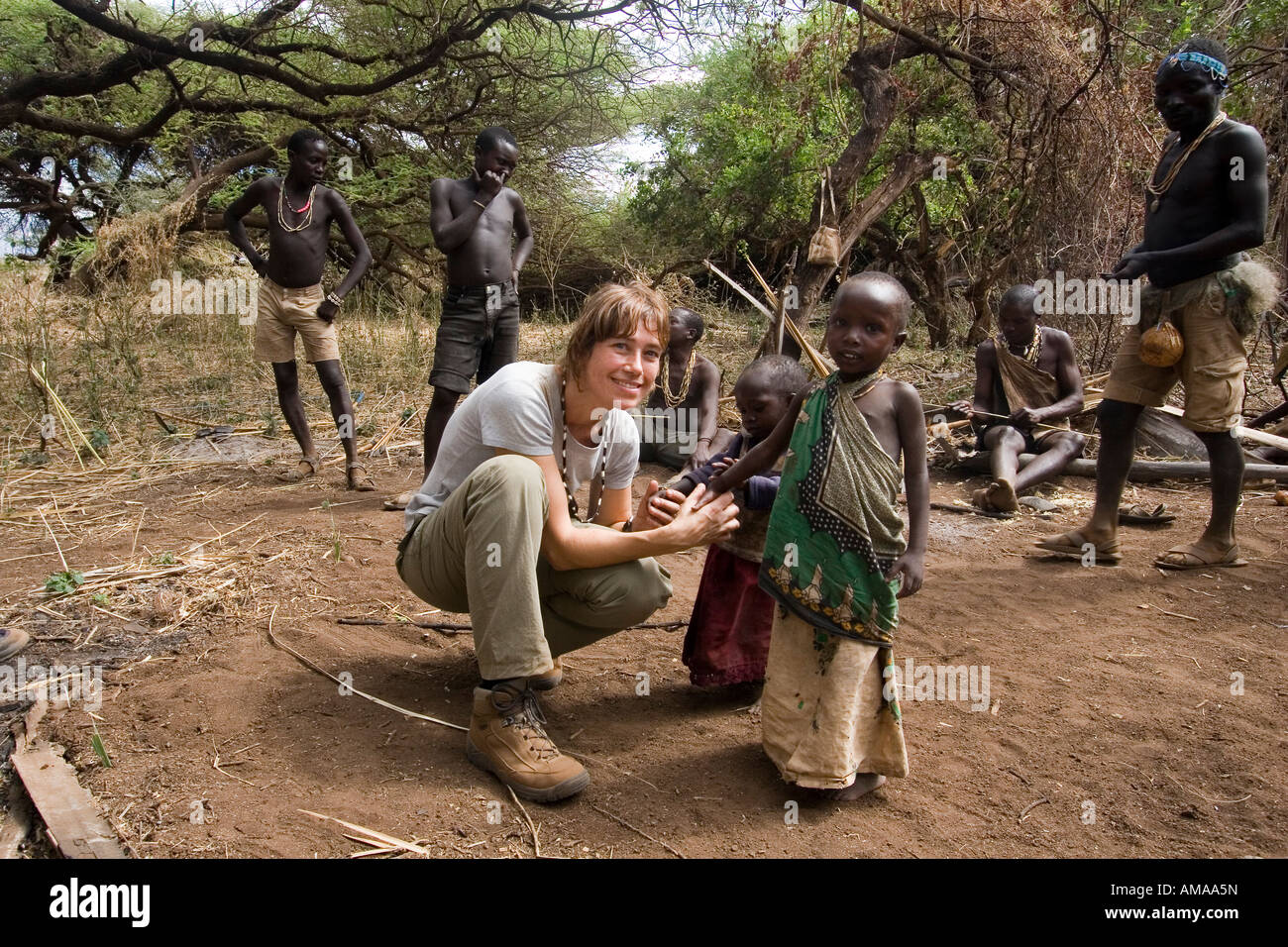 tourist with hadzabe children Stock Photo - Alamy