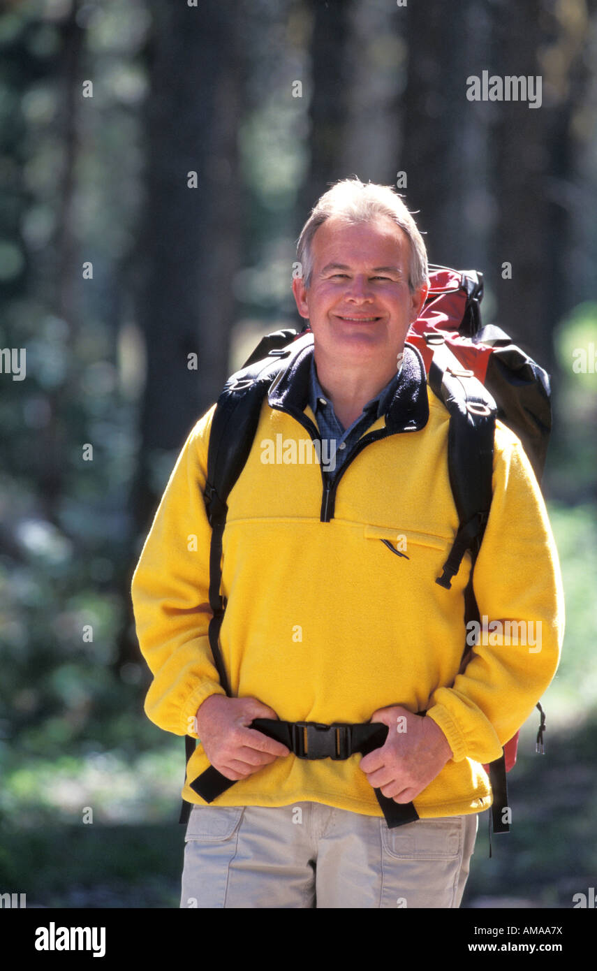 Man Walking with Backpack Stock Photo - Alamy
