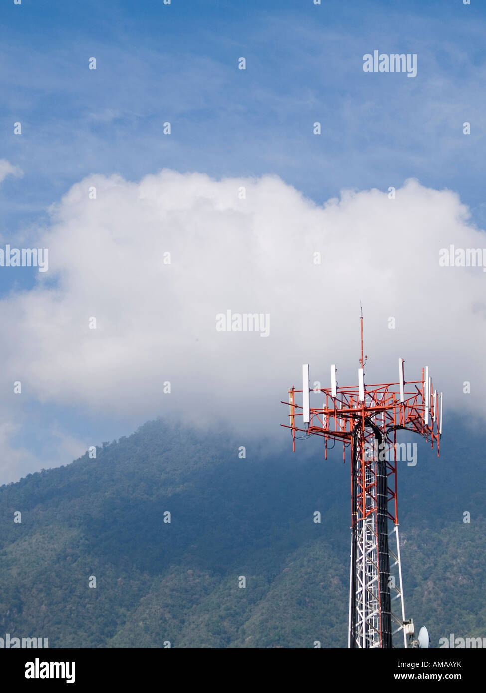 Santiago Atitlan, Guatemala: Cell phone tower contrast with volcano ...