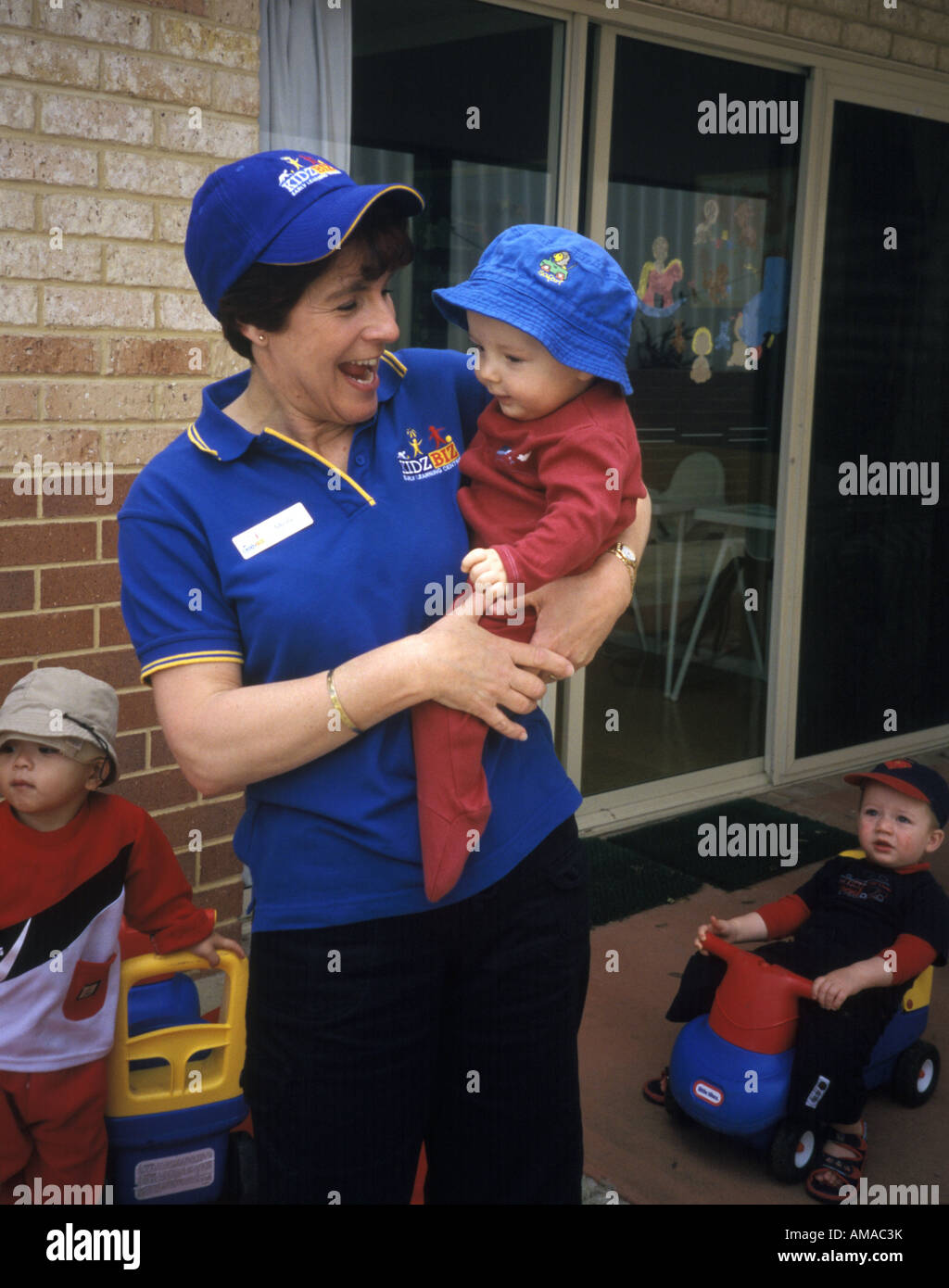 Carer and child Stock Photo - Alamy