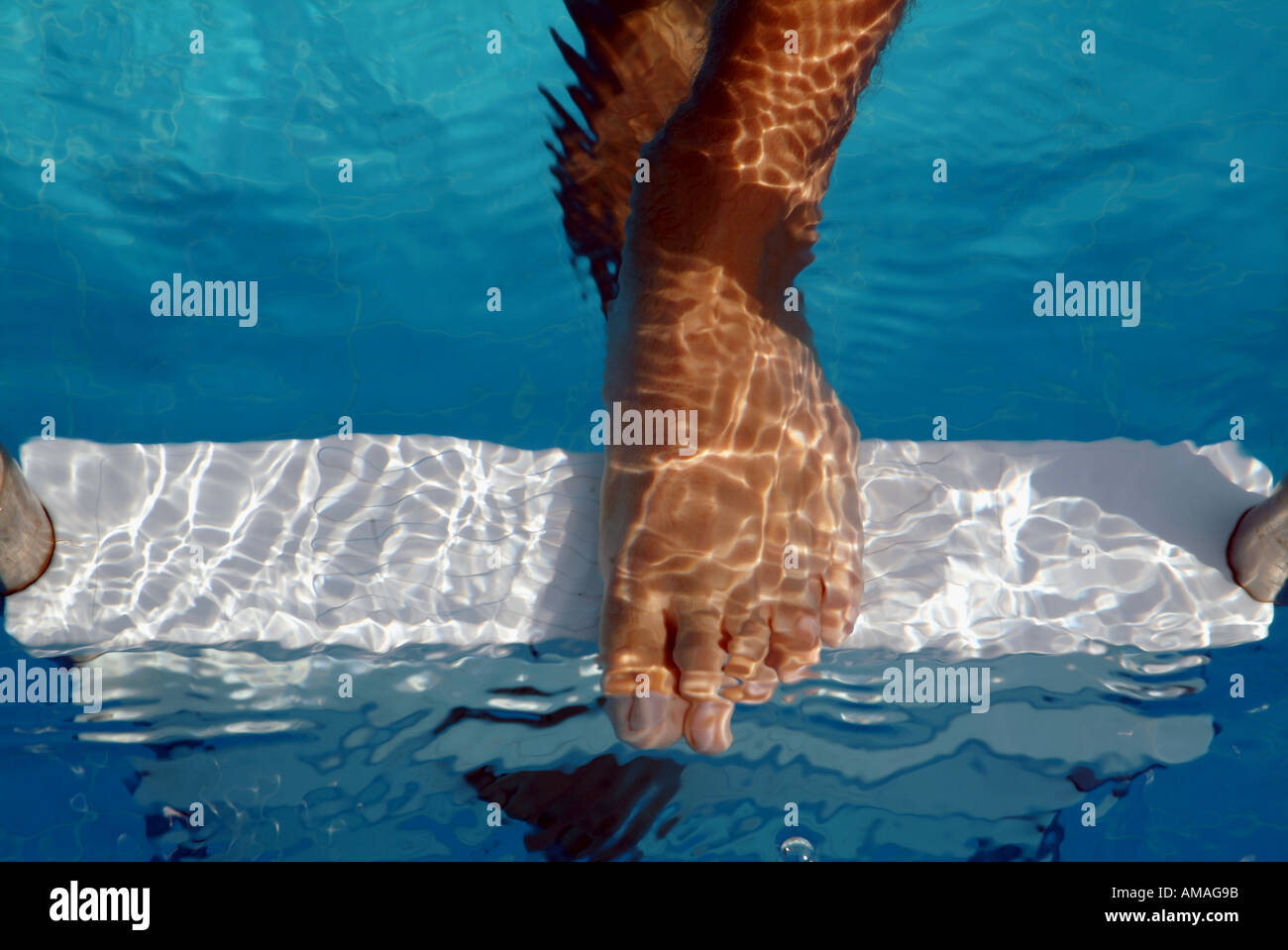 POOL SIDE STEPS OUT Stock Photo - Alamy