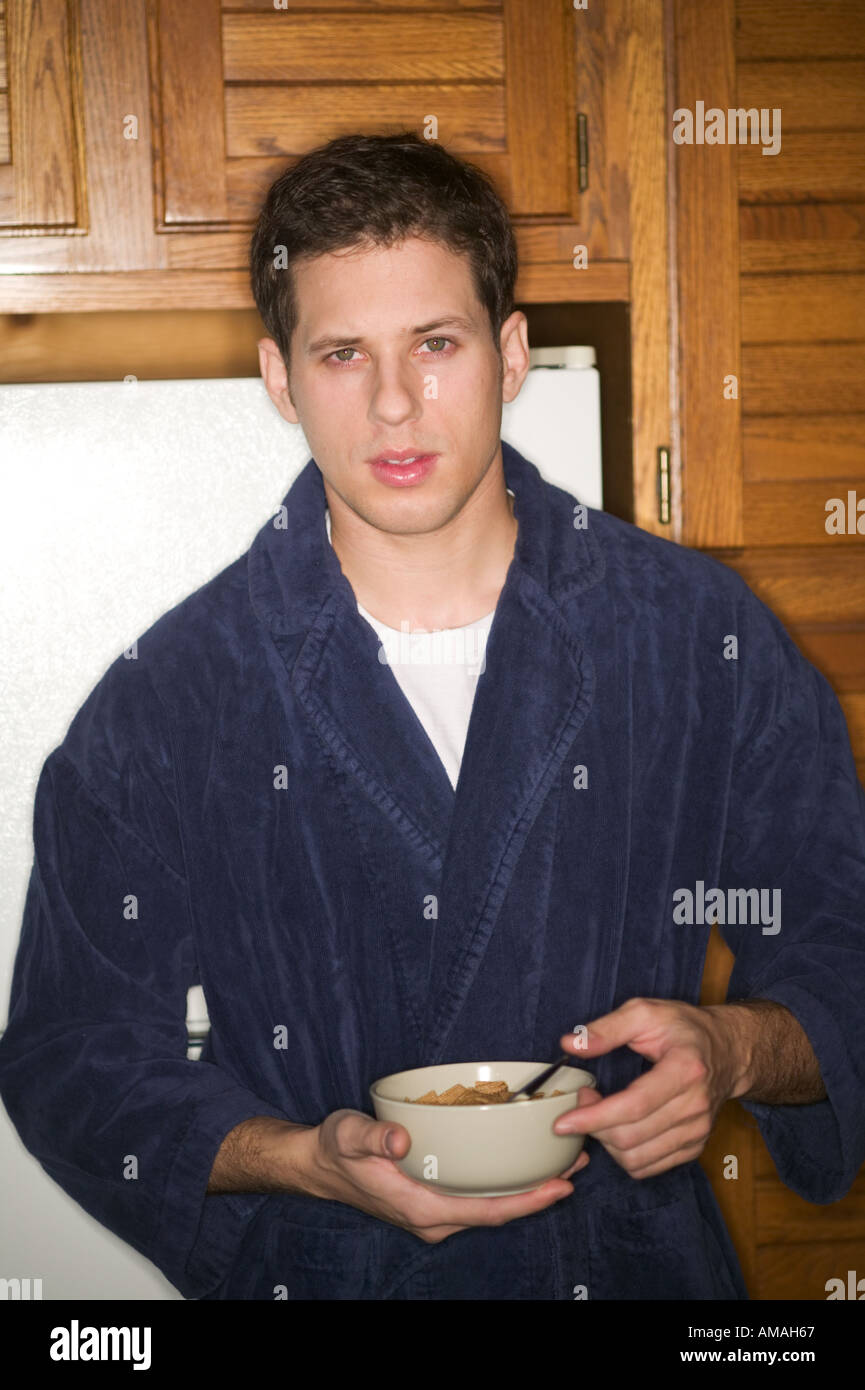 Man eating cereal Stock Photo - Alamy