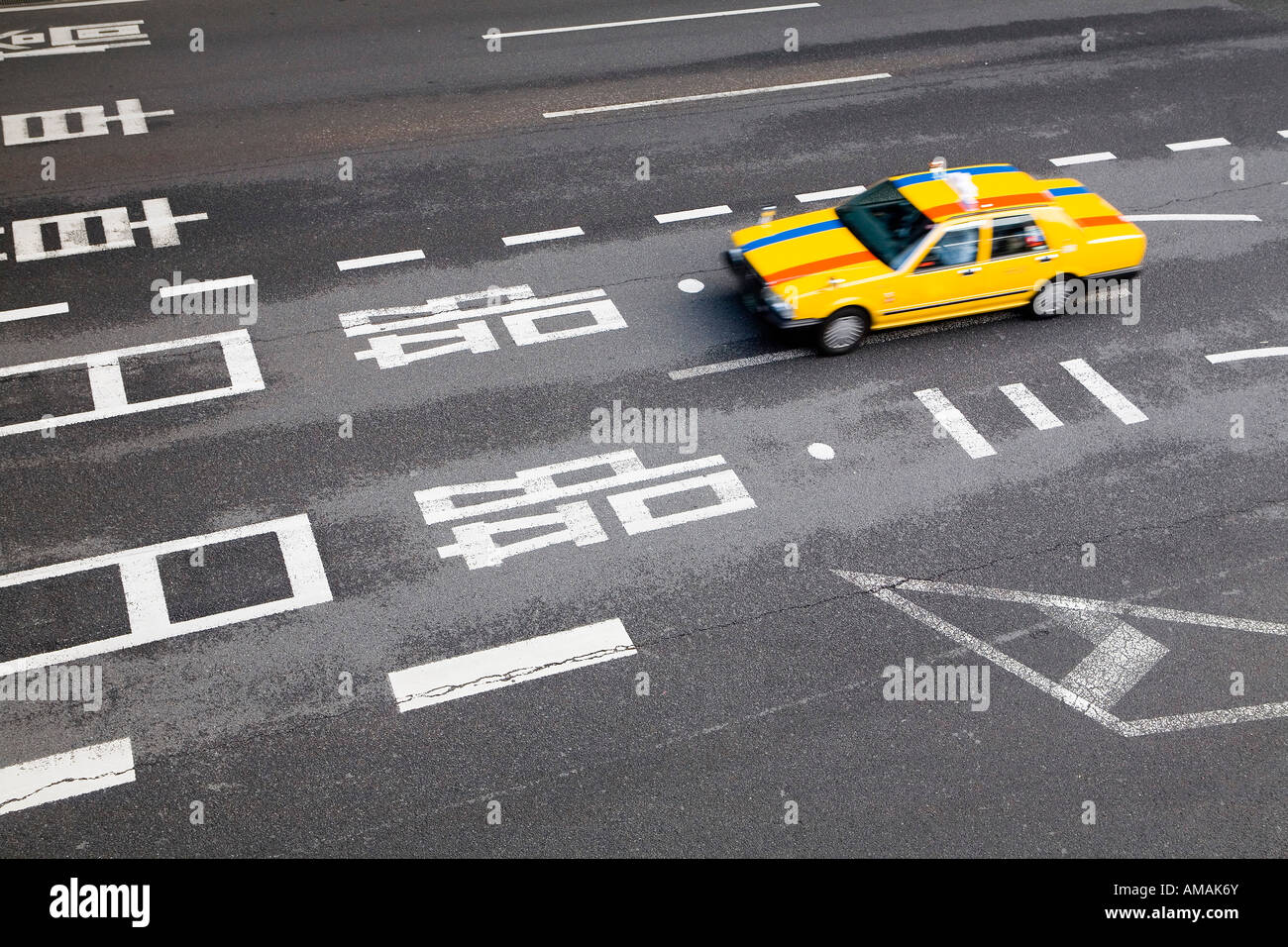 A yellow taxi on a highway Stock Photo - Alamy