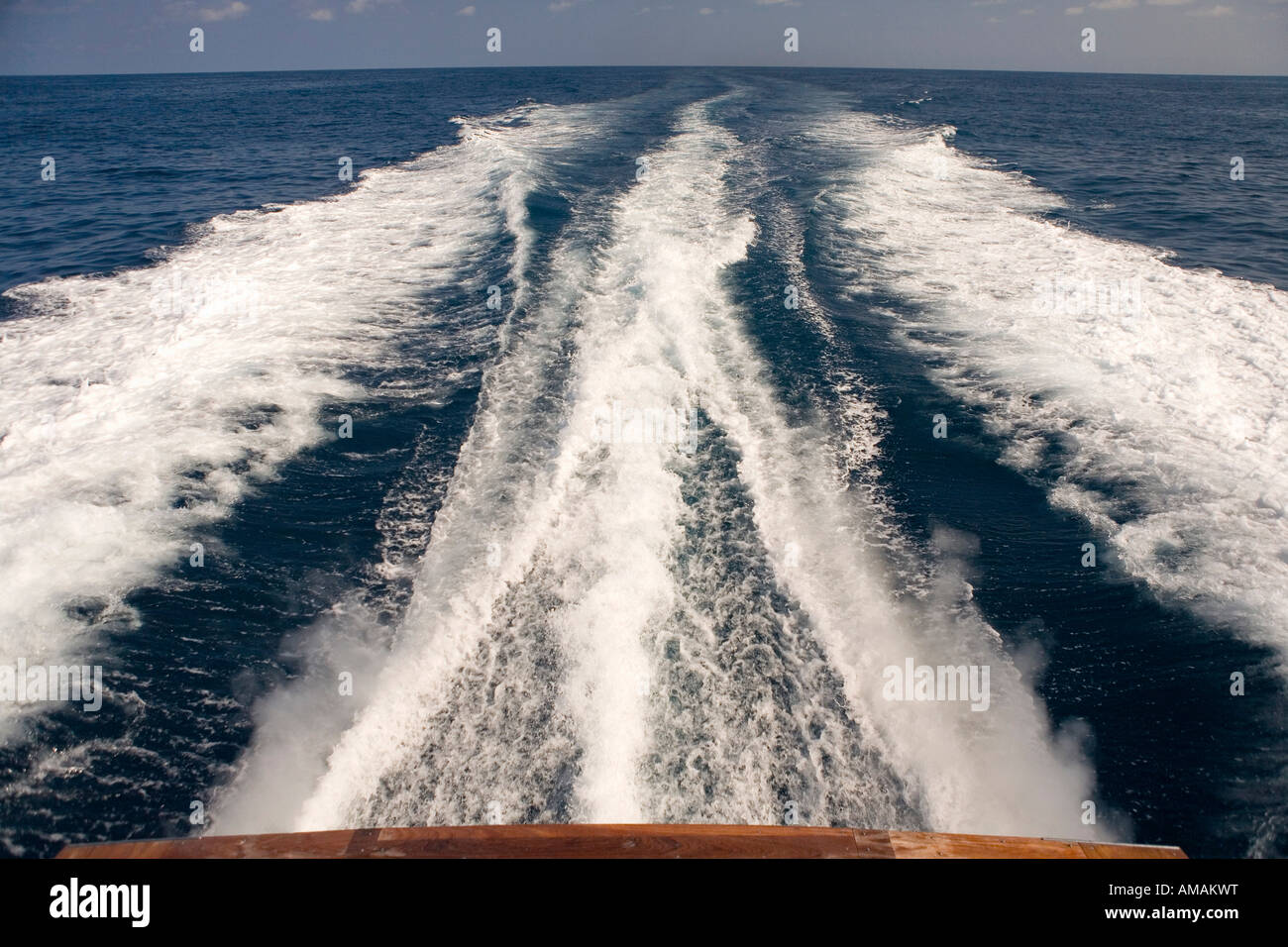 Wake of a boat Stock Photo - Alamy