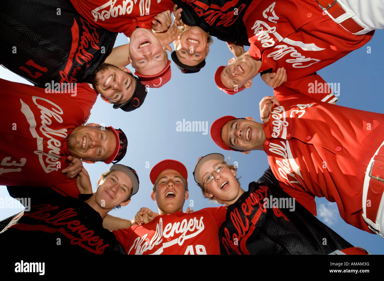 A baseball team standing in a huddle Stock Photo - Alamy