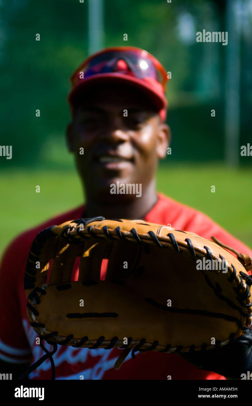 A baseball player behind a glove Stock Photo - Alamy