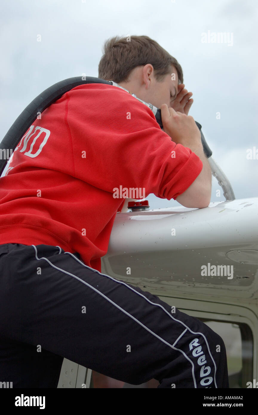 Refueling a light aircraft Stock Photo - Alamy