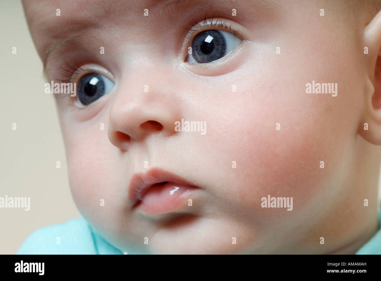 A baby staring Stock Photo - Alamy