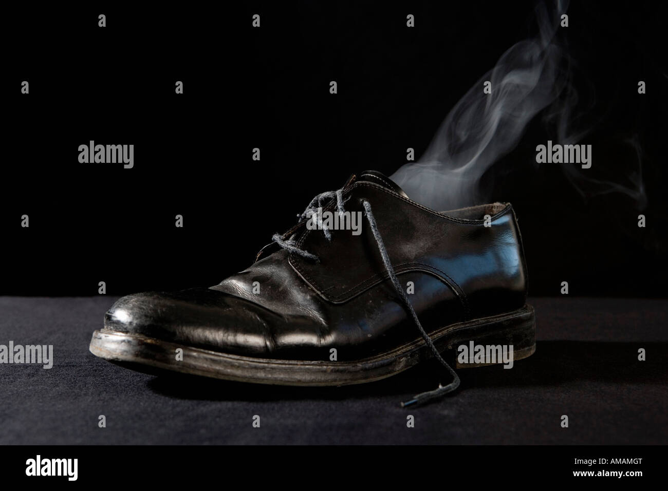 Smoke coming from a leather shoe Stock Photo - Alamy