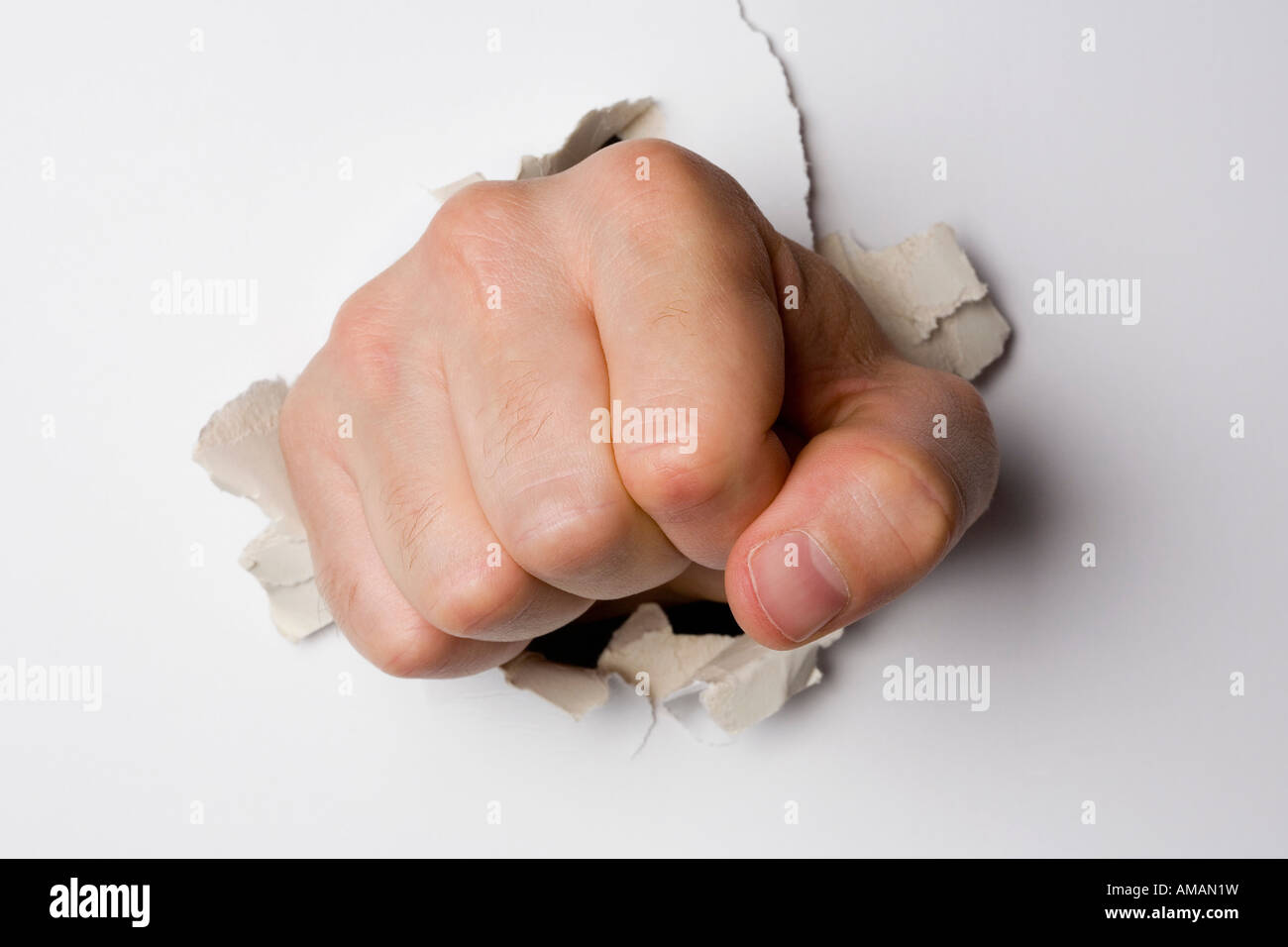 Fist Punching Through Wall High Resolution Stock Photography and Images ...