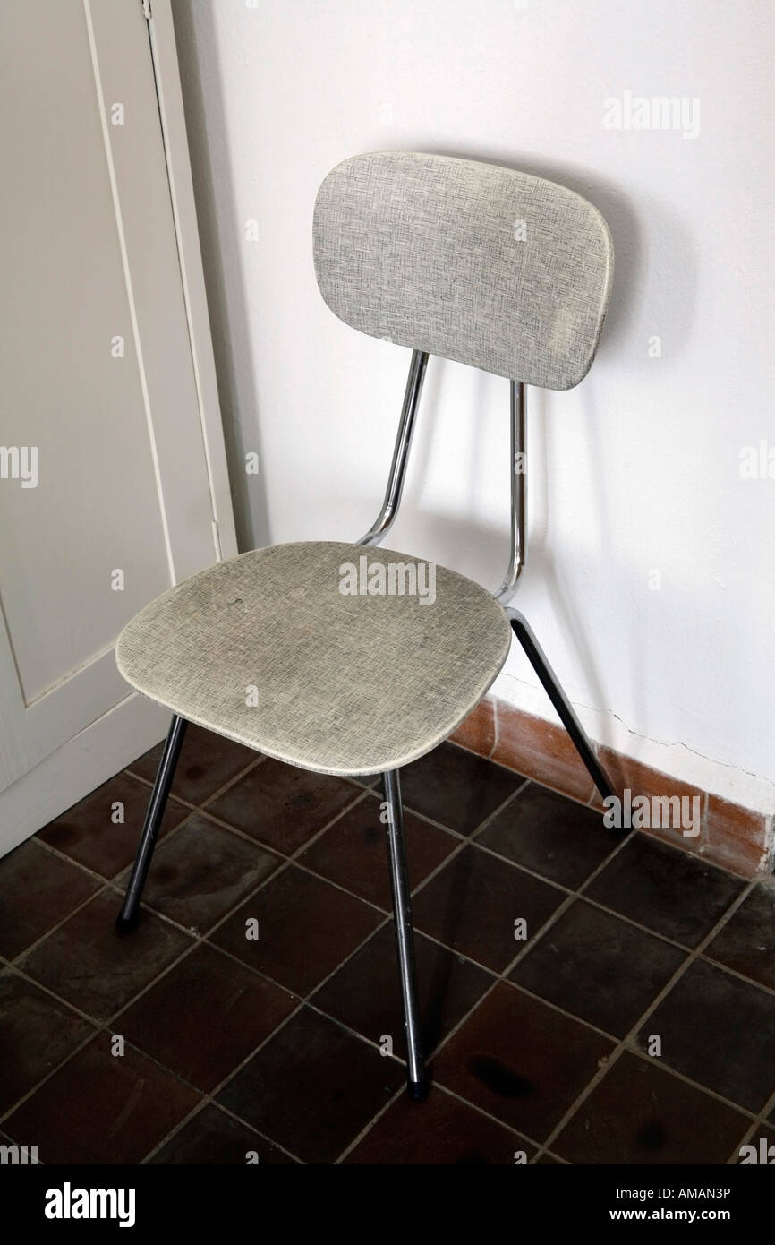 A chair in a corner Stock Photo - Alamy