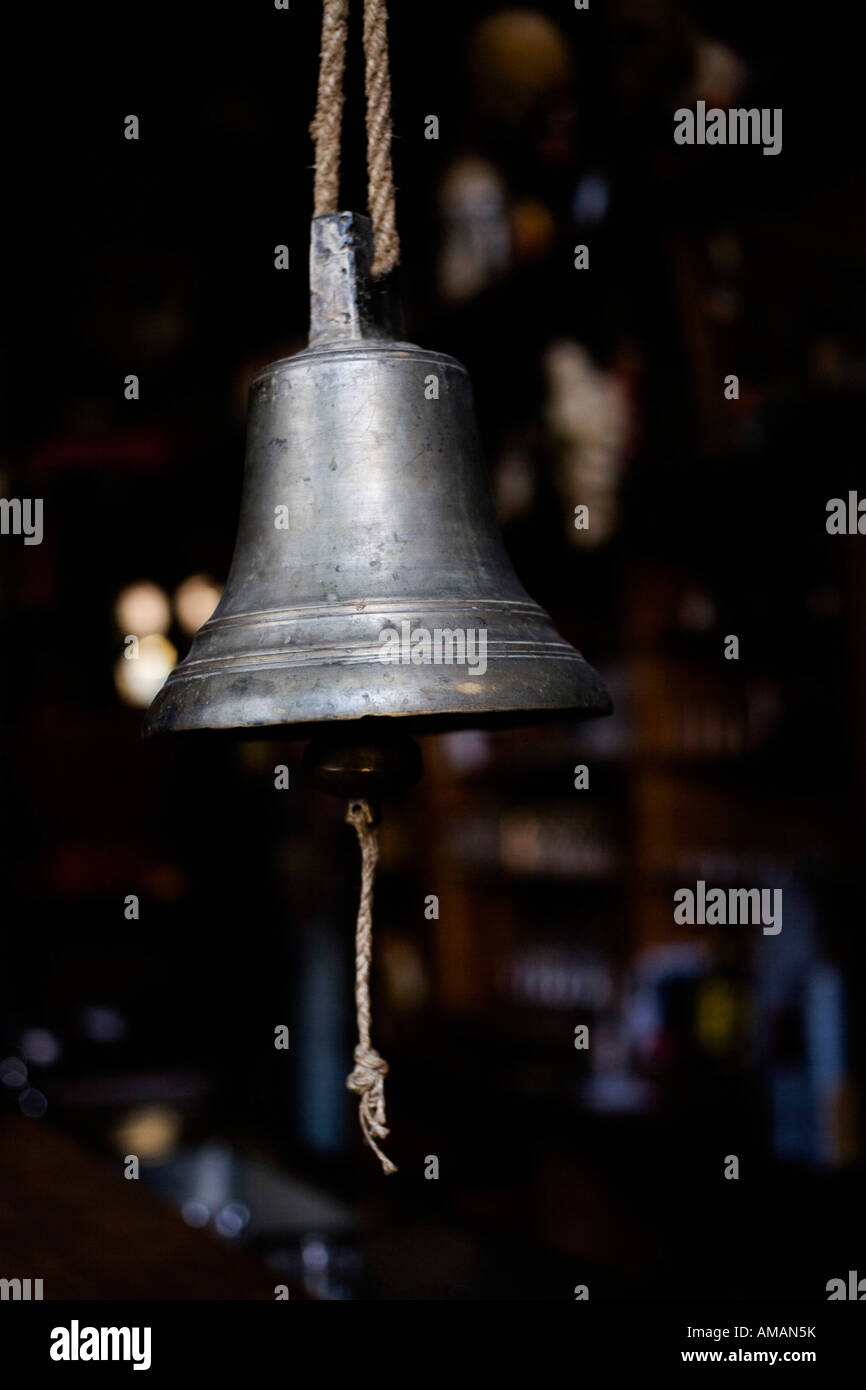 A bell hanging in a bar Stock Photo - Alamy