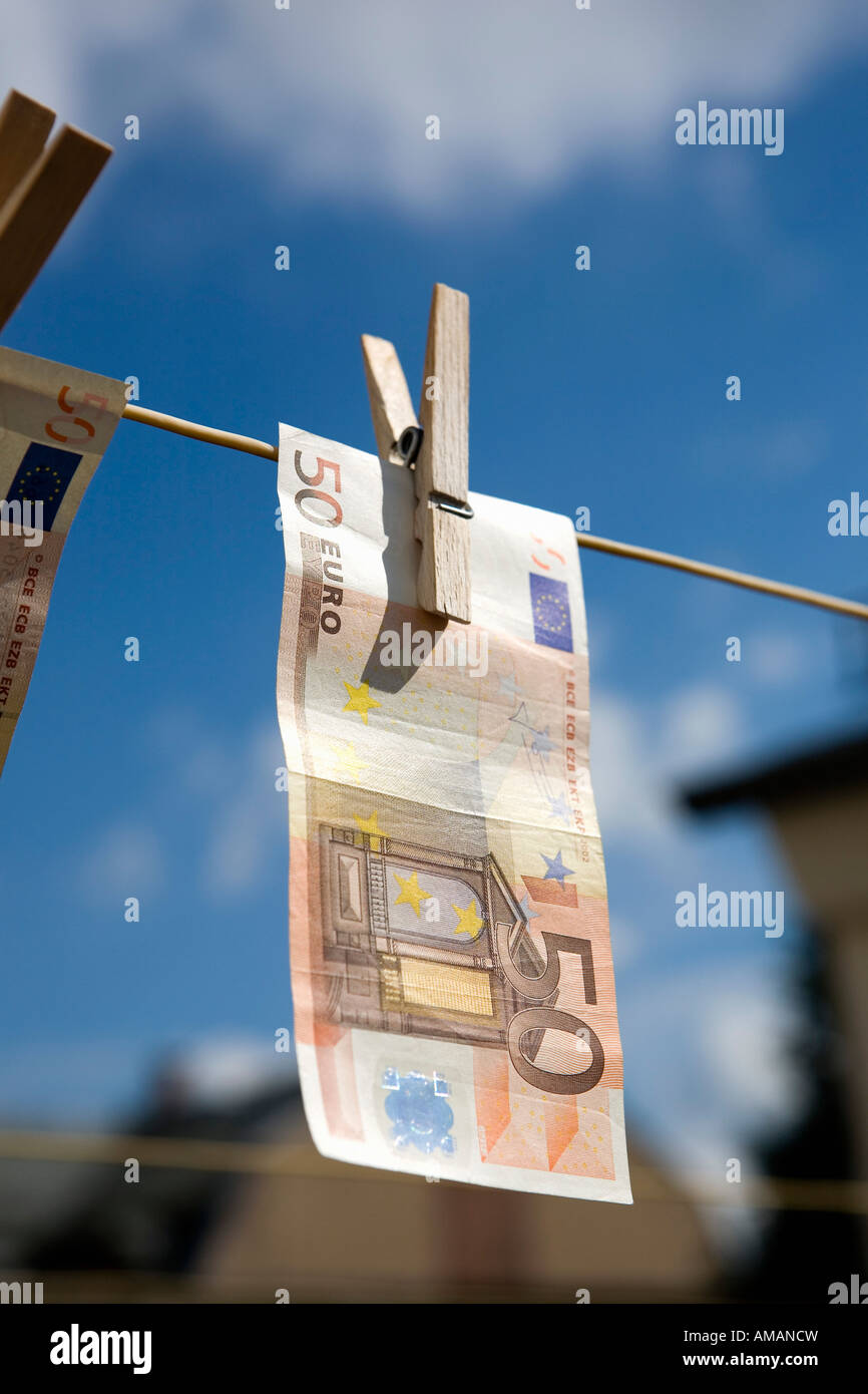 Money hanging on a washing line Stock Photo - Alamy
