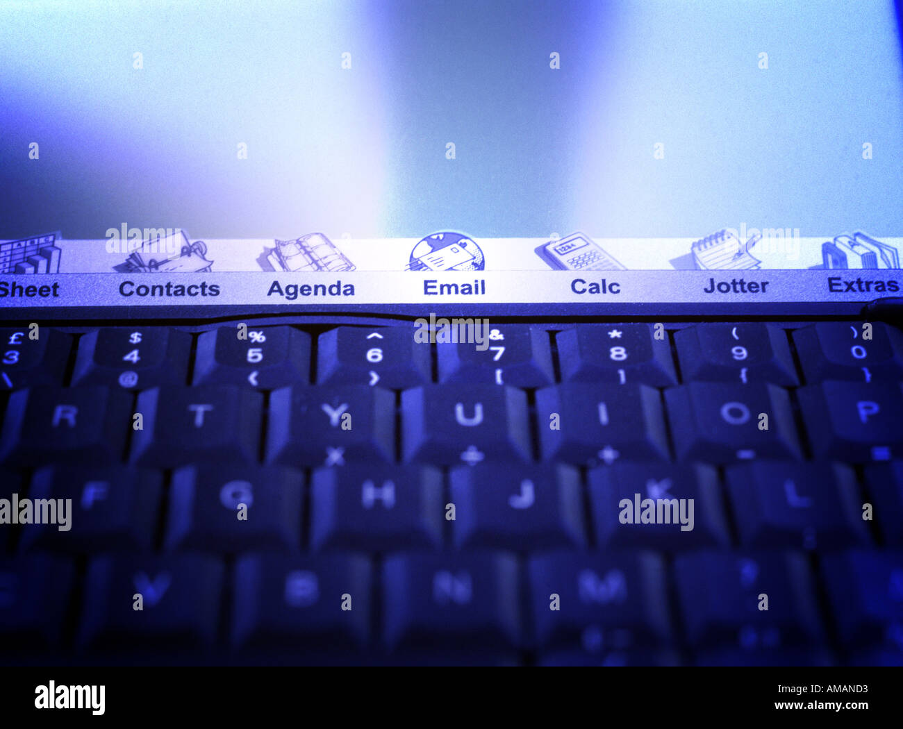 e mail icon emphasised on pda computer Stock Photo - Alamy