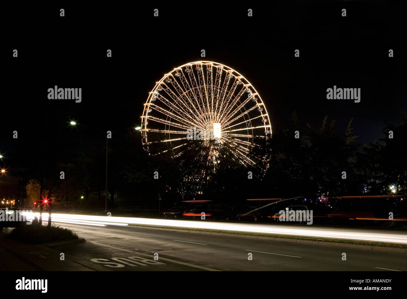 A Ferris wheel at night Stock Photo - Alamy