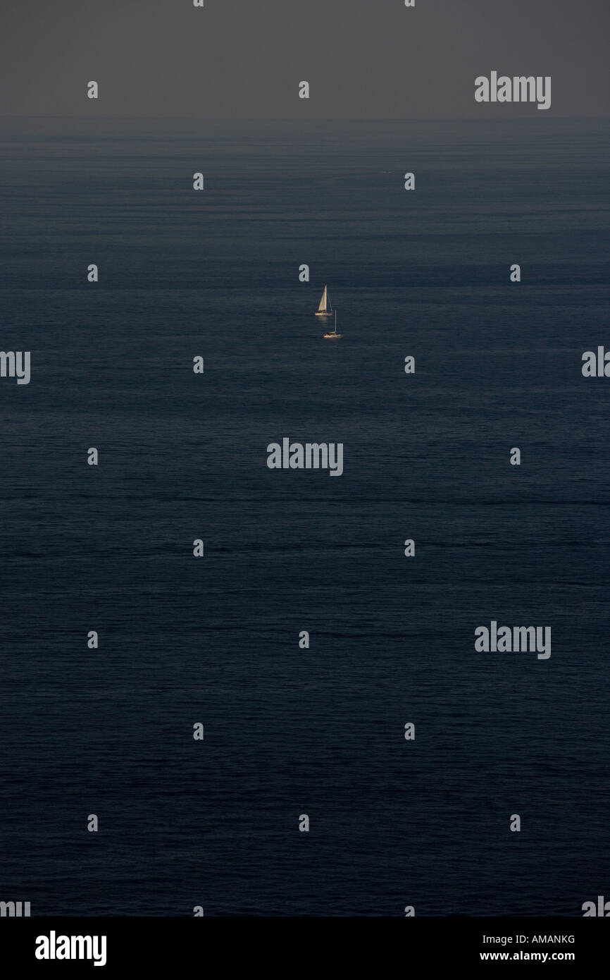 Sailing boat in the distance hi-res stock photography and images - Alamy