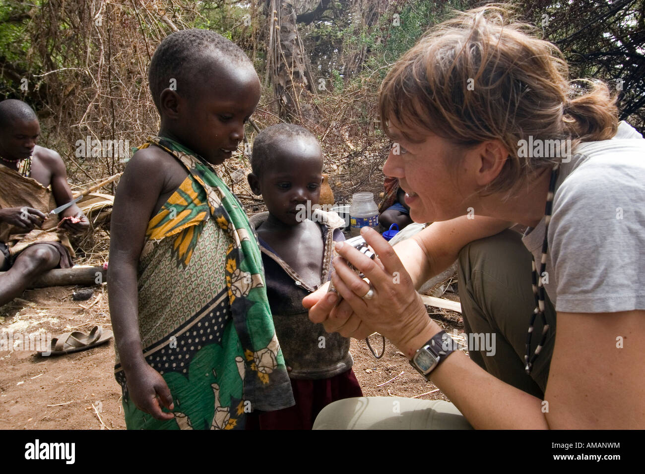 tourist with hadzabe children Stock Photo - Alamy