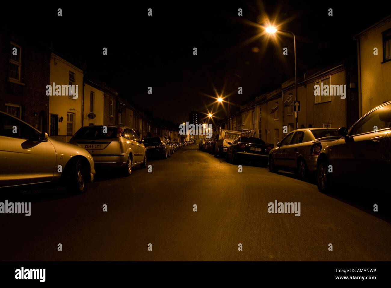 A one way street at night Stock Photo - Alamy