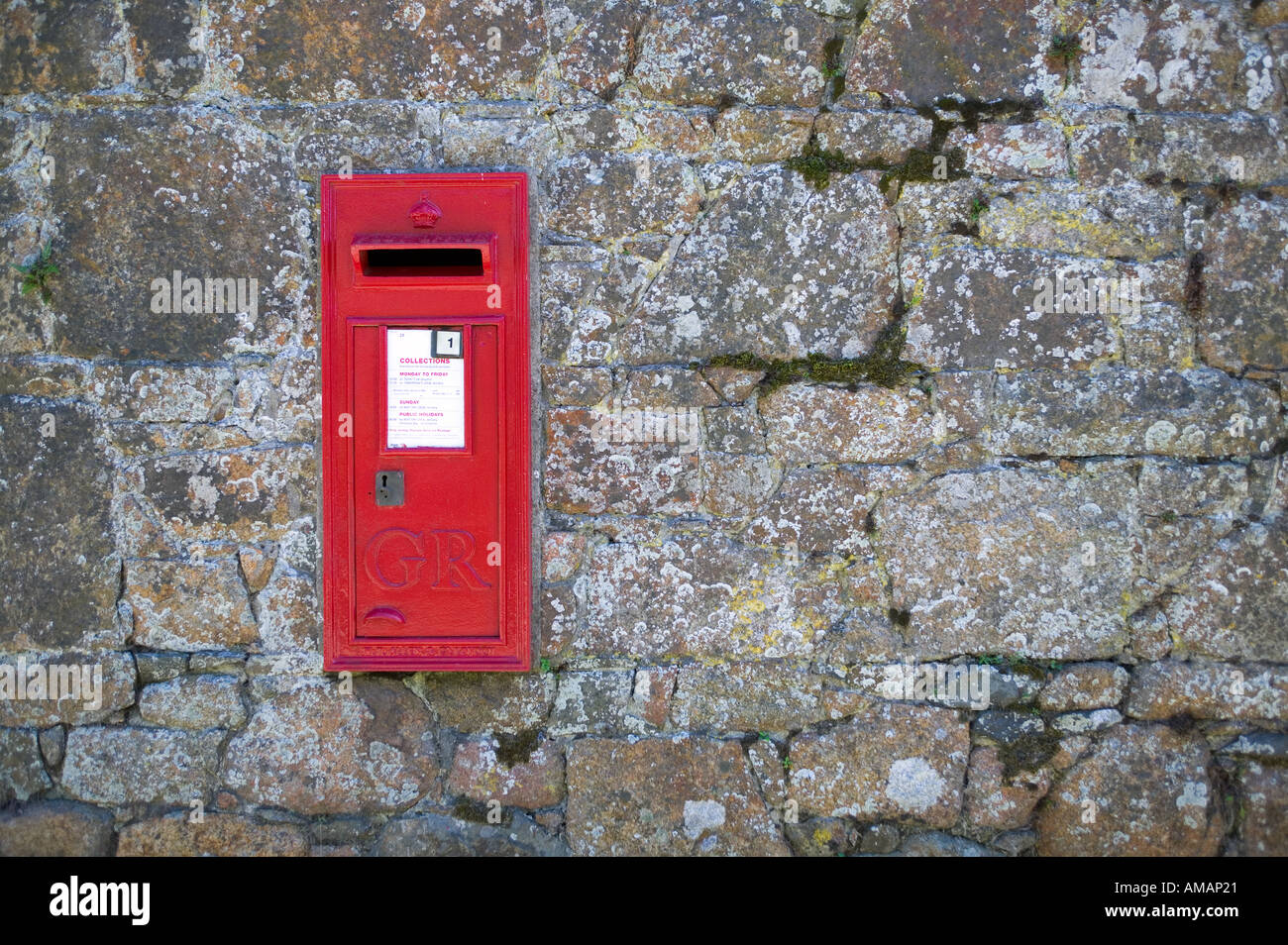 Post Office Box built into Granite wall jersey Stock Photo - Alamy