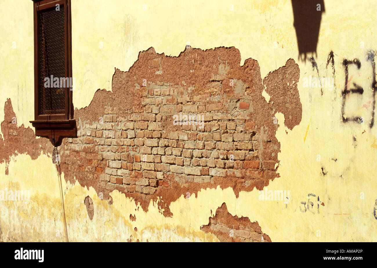 Brick Wall with Plaster falling away in Venice Italy Stock Photo - Alamy