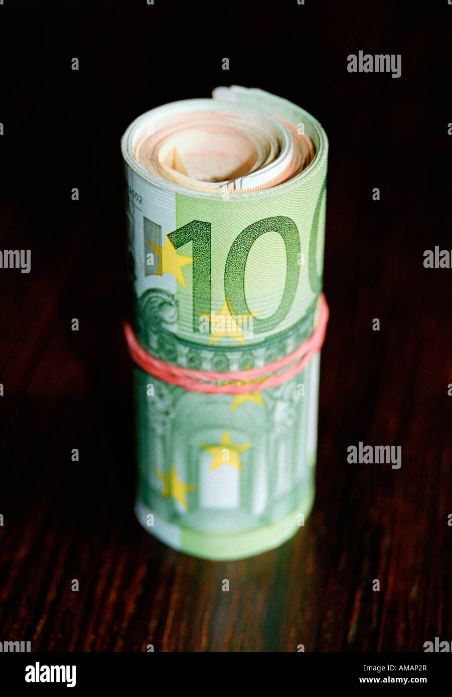 A roll of Euro banknotes Stock Photo - Alamy