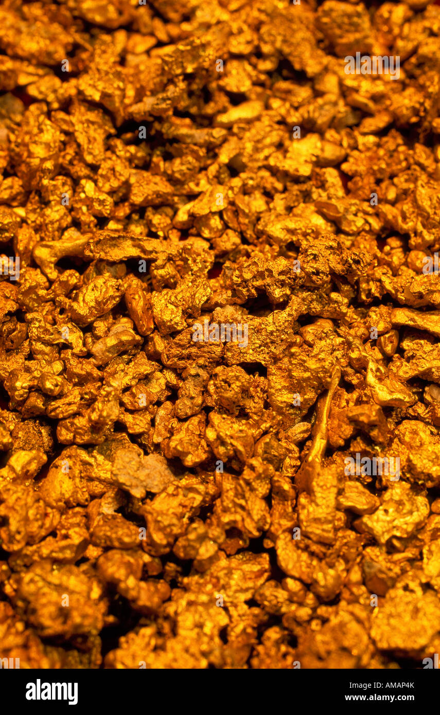 Assorted small gold nuggets Stock Photo - Alamy