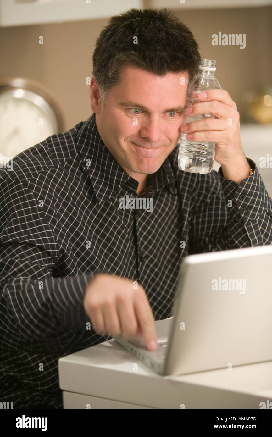 Frustrated computer worker causcasian male late 40s Stock Photo - Alamy