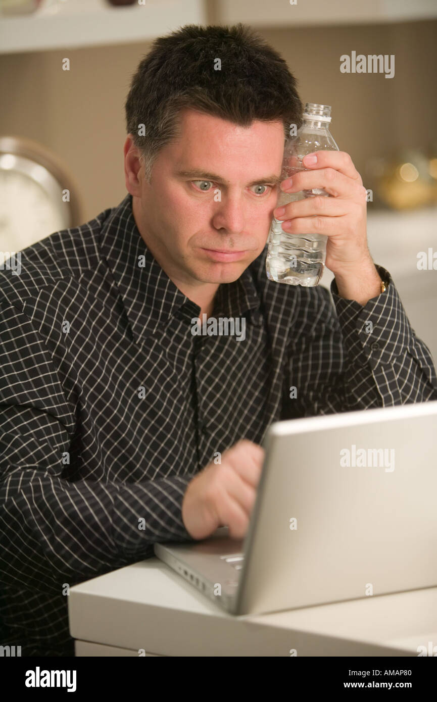 Frustrated computer worker causcasian male late 40s Stock Photo - Alamy