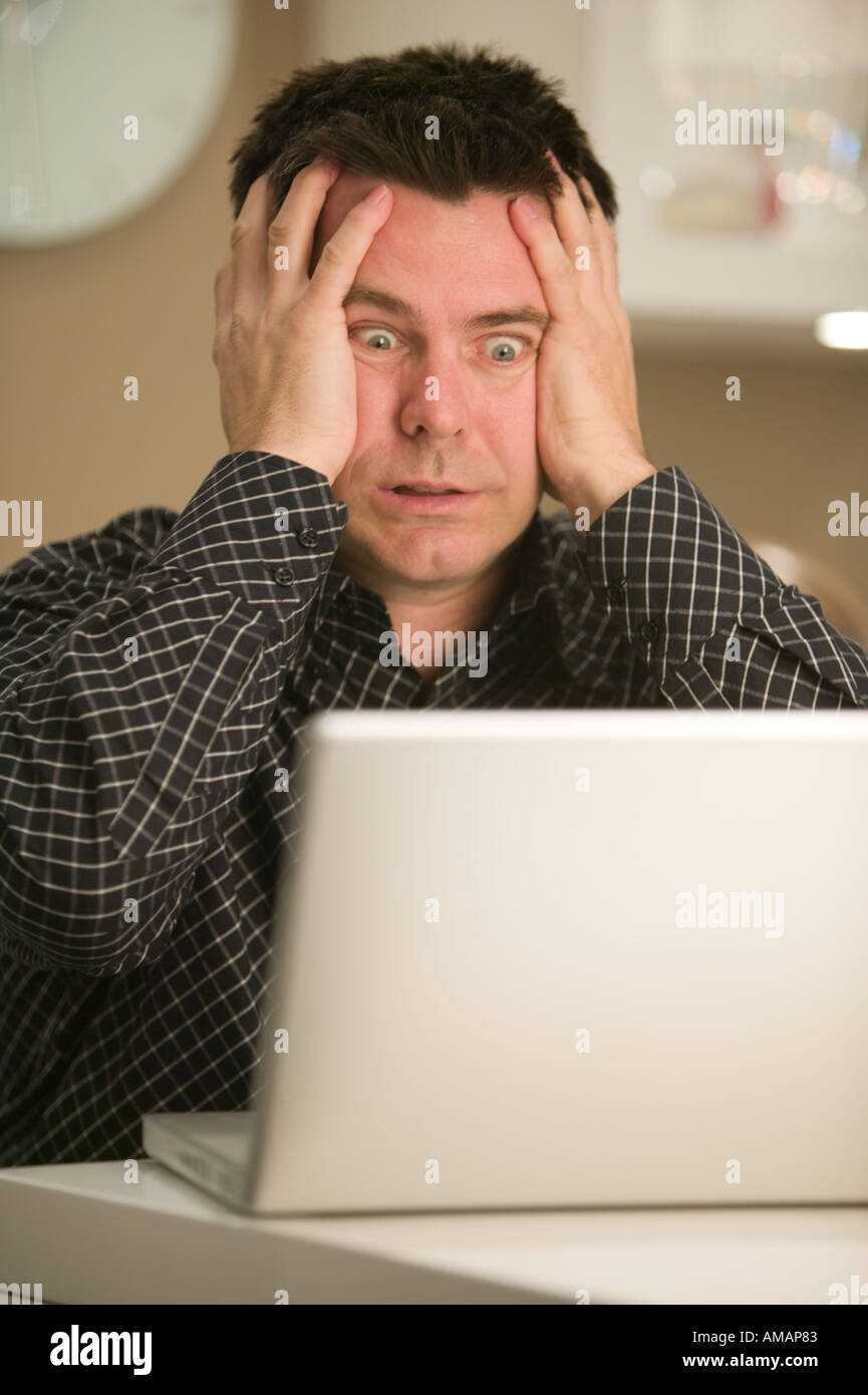 Frustrated computer worker causcasian male late 40s Stock Photo - Alamy