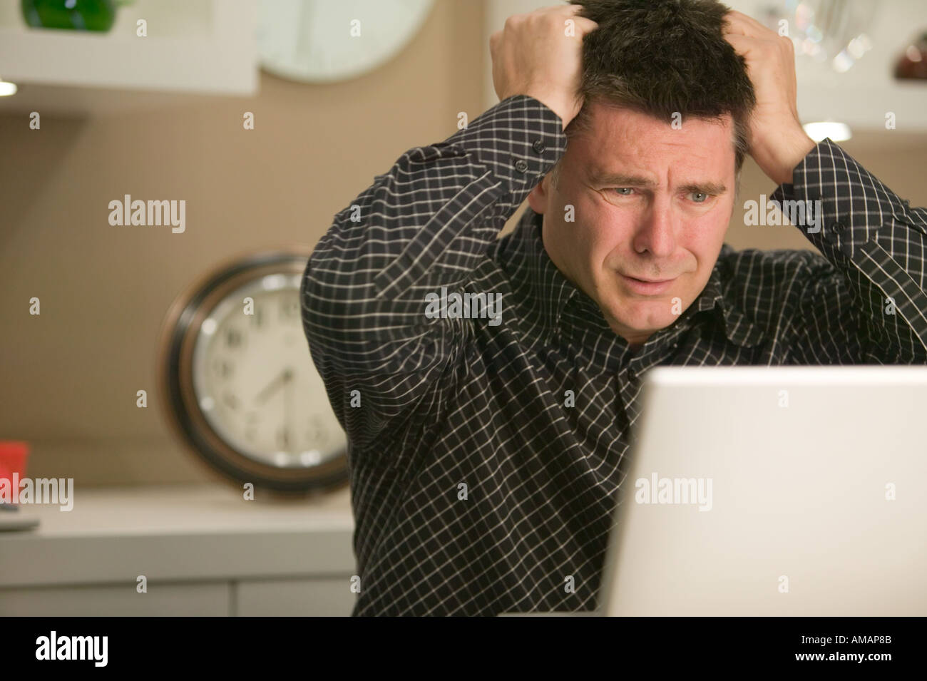 Frustrated computer worker causcasian male late 40s Stock Photo - Alamy