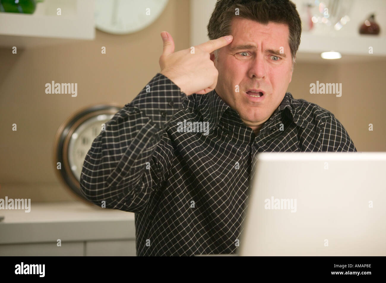 Frustrated computer worker causcasian male late 40s Stock Photo - Alamy