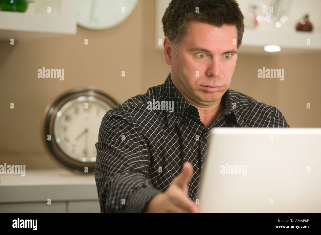 Frustrated computer worker causcasian male late 40s Stock Photo - Alamy
