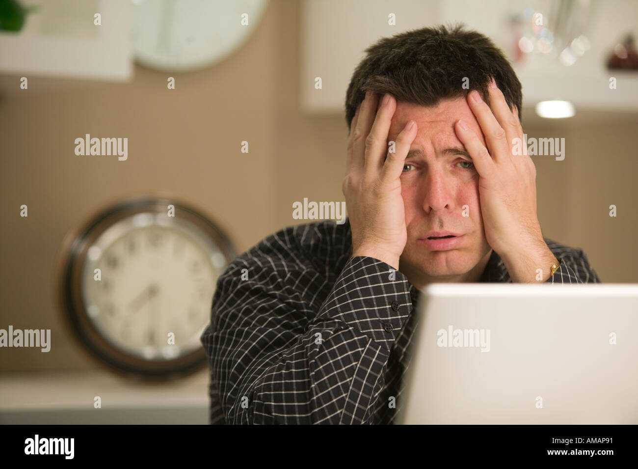 Frustrated computer worker causcasian male late 40s Stock Photo - Alamy