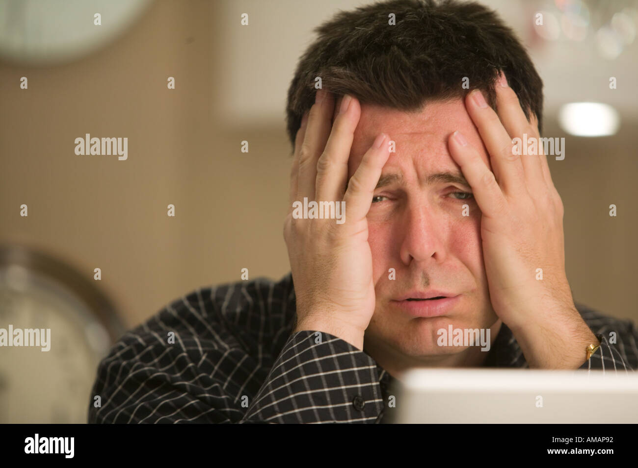 Frustrated computer worker causcasian male late 40s Stock Photo - Alamy