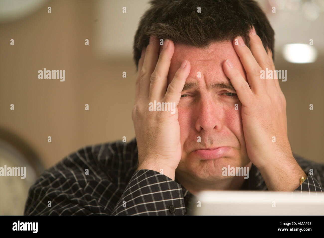 Frustrated computer worker causcasian male late 40s Stock Photo - Alamy